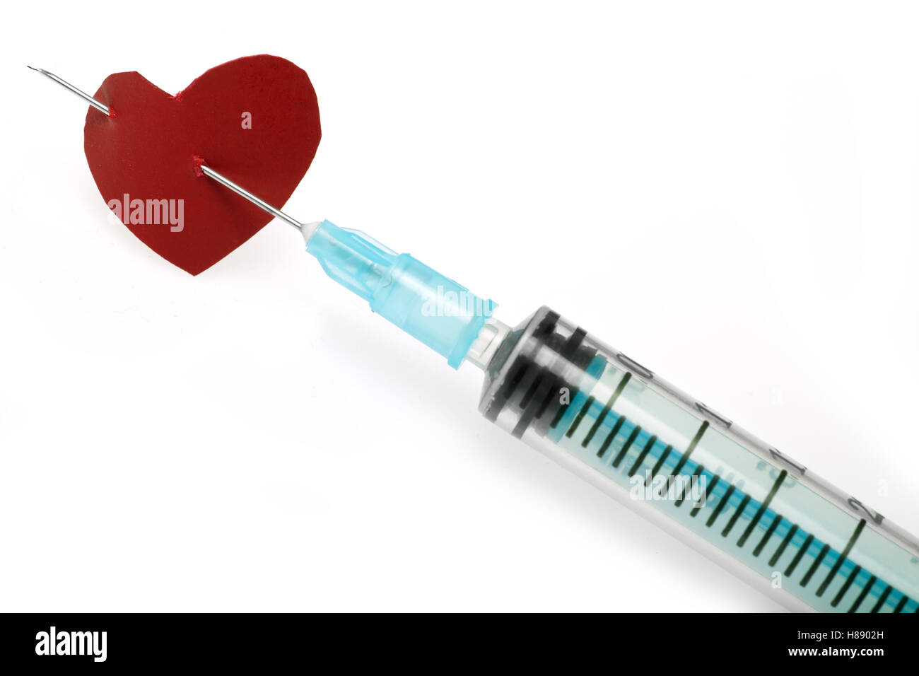 paper heart on a needle of syringe Stock Photo - Alamy