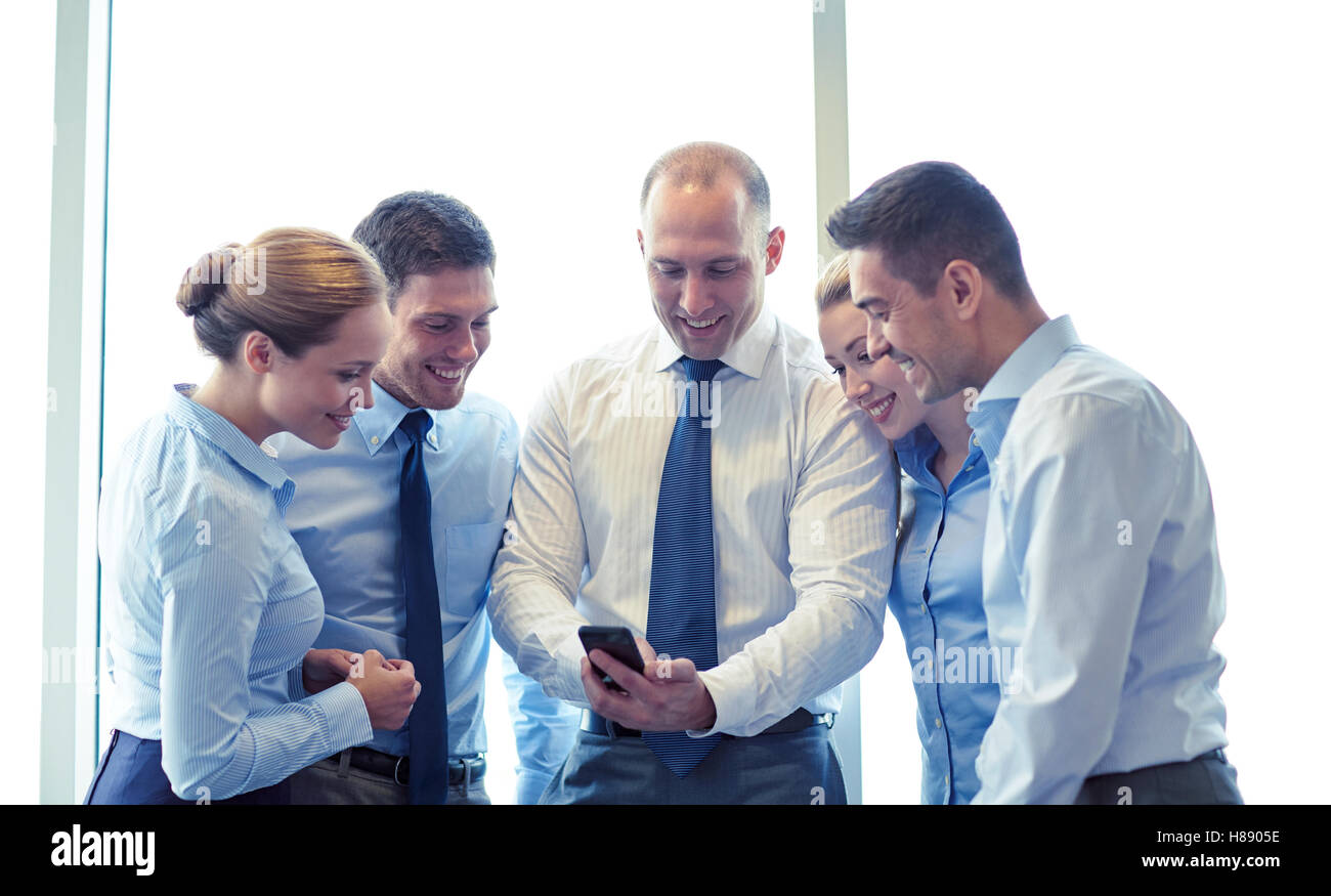 business people with smartphone and smartphones Stock Photo - Alamy