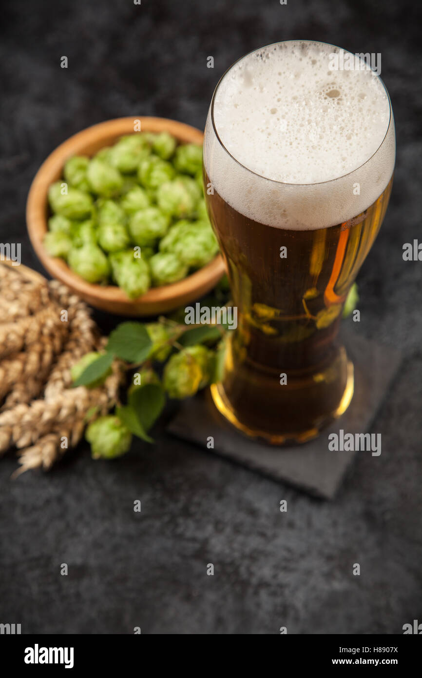 Beer glass on dark background Stock Photo - Alamy