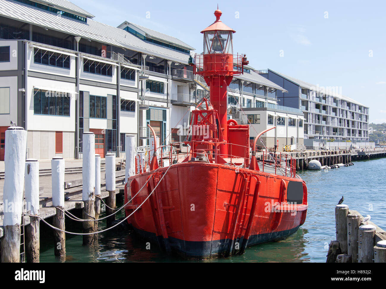 The bright red boat with a lighthouse docked in Sydney (New South Wales ...