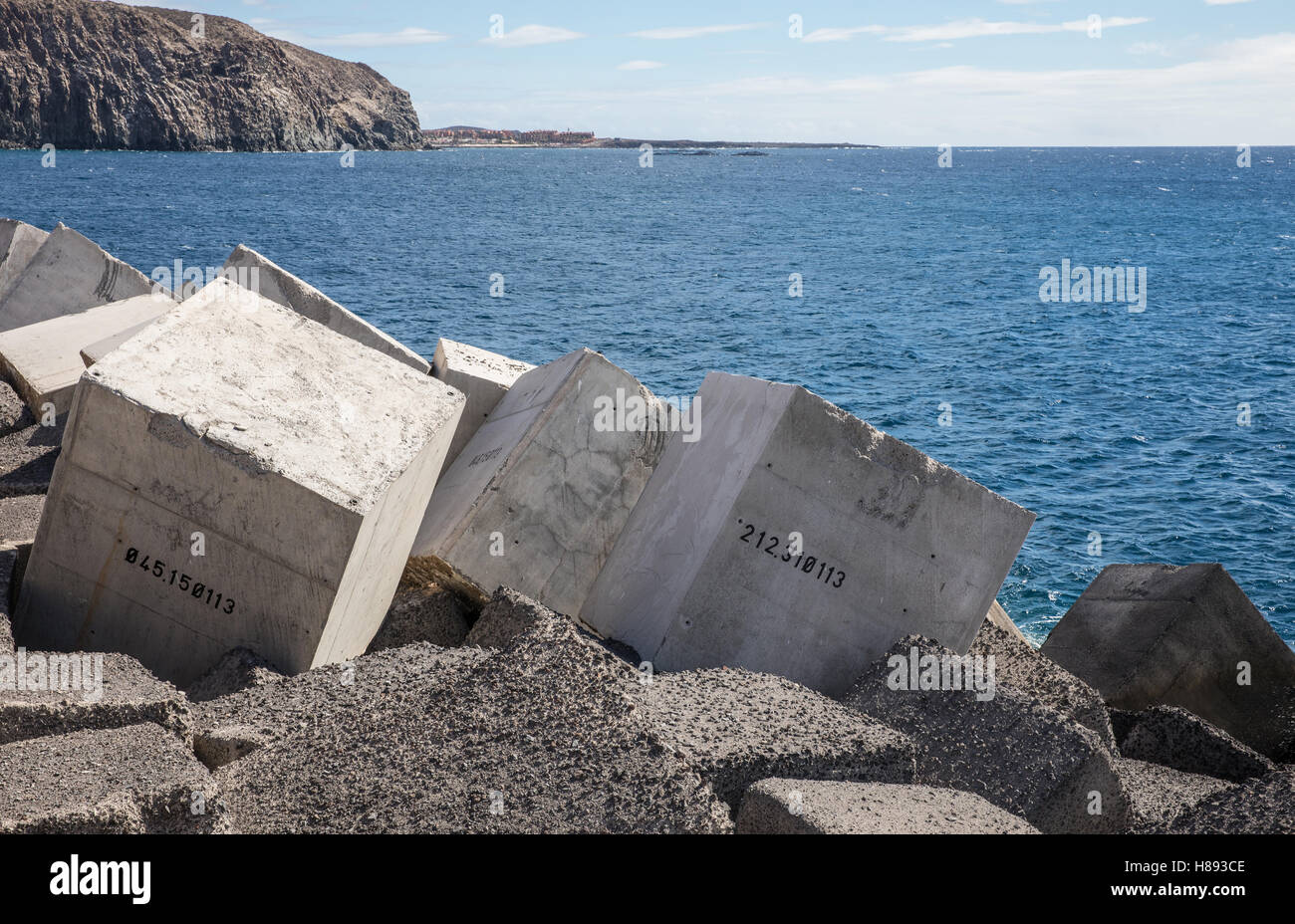 Concrete blocks numbered in the jetty of Los Cristiano Stock Photo - Alamy