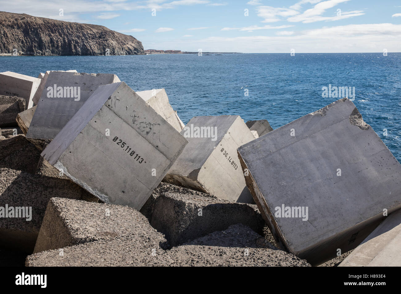 Concrete blocks numbered in the jetty of Los Cristiano Stock Photo - Alamy