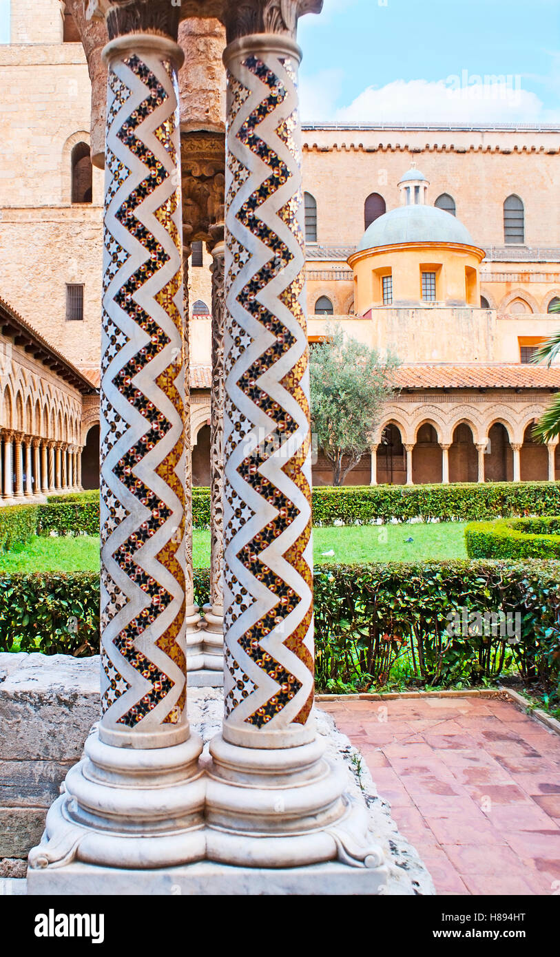 The white stone columns in garden of Monreale Cathedral decorated with ...