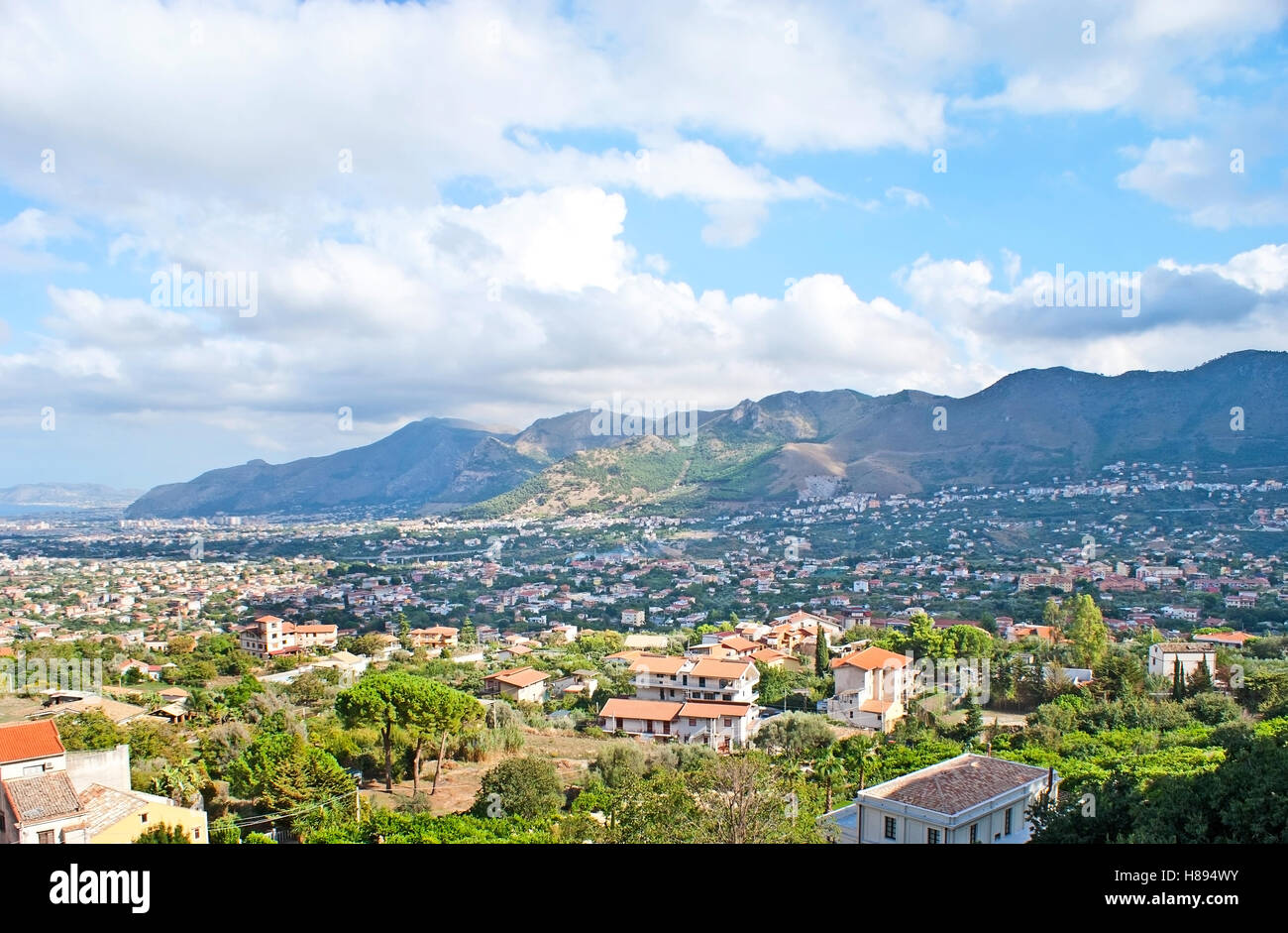 The slopes of Monte Caputo covered with the lush gardens and villas ...