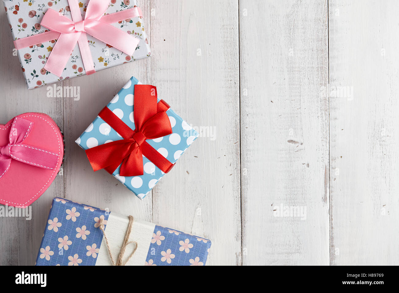 Gift boxes on white background Stock Photo - Alamy