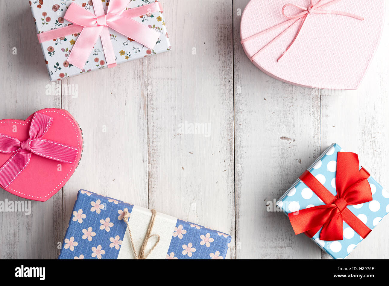 Gift boxes on white background Stock Photo - Alamy