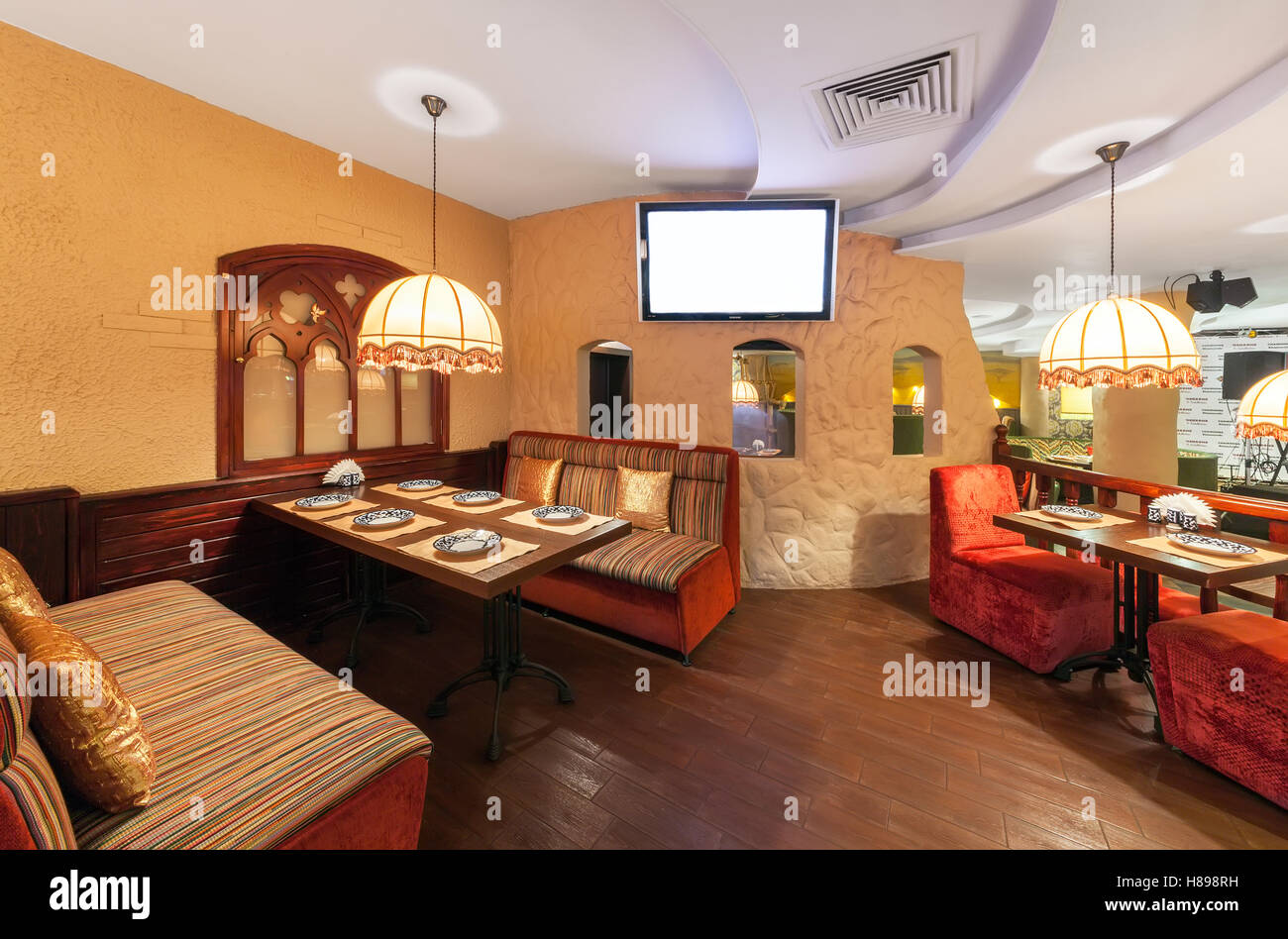 Eastern interior of the uzbek restaurant. The table in the restaurant ...