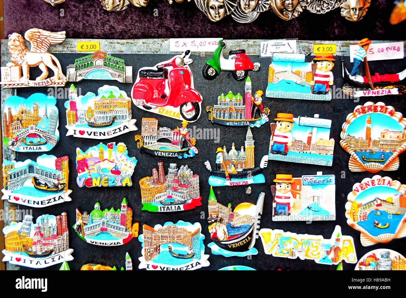 Venice souvenir scooter lion St Marks fridge magnets Stock Photo - Alamy
