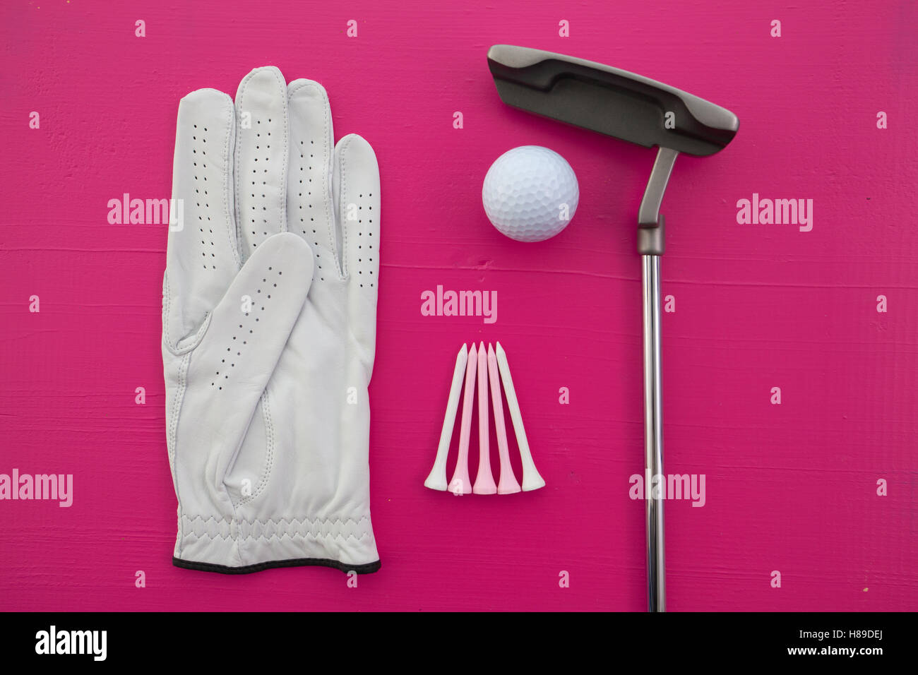 Pink wooden golf tees hi-res stock photography and images - Alamy
