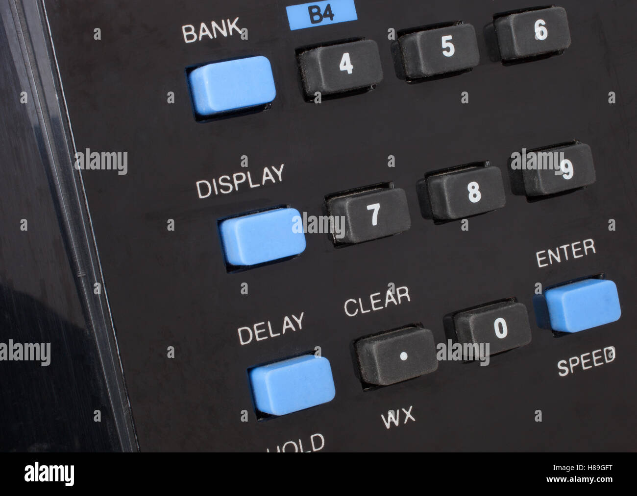 Buttons on the front panel of a weather alert radio Stock Photo - Alamy