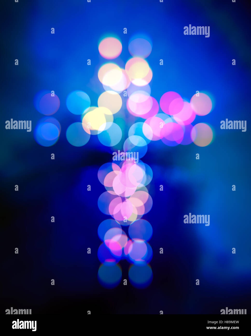 Bright holy cross bokeh effect Stock Photo - Alamy