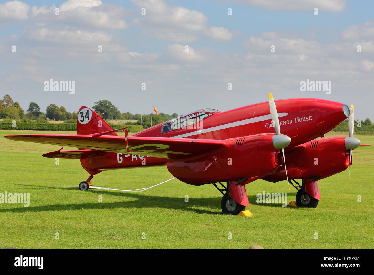 Vintage de Havilland DH.88 Comet racing aircraft parked near the runway ...