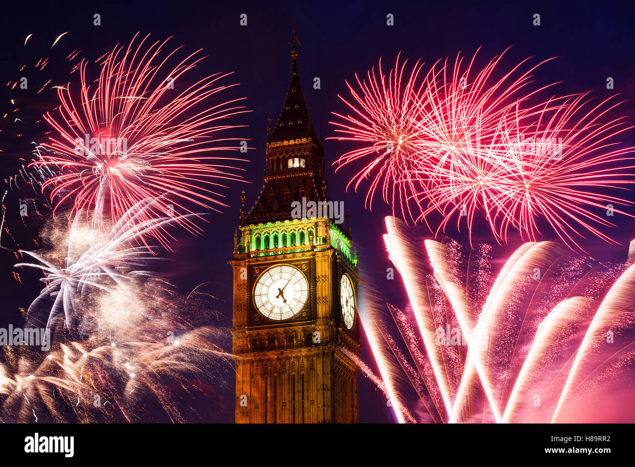 explosive fireworks display around Big Ben. New Year's Eve in the city ...