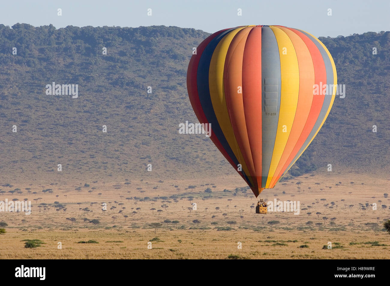 Hot air balloon over savanna, Masai Mara Triangle, Kenya Stock Photo ...