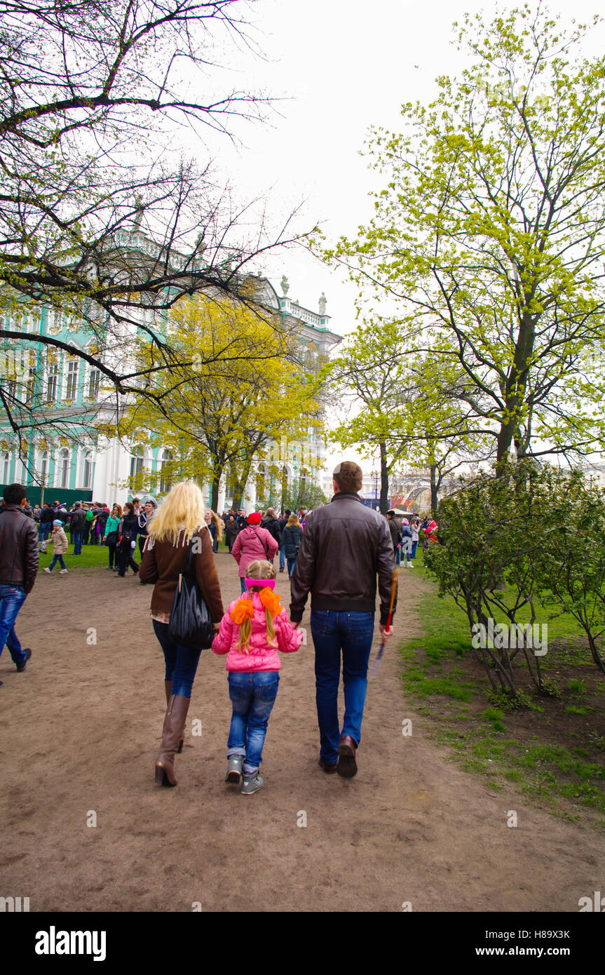 a family on a walk in a park in spring Stock Photo - Alamy