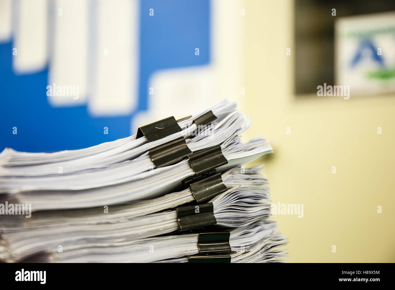 A pile of documents Desk Stock Photo - Alamy