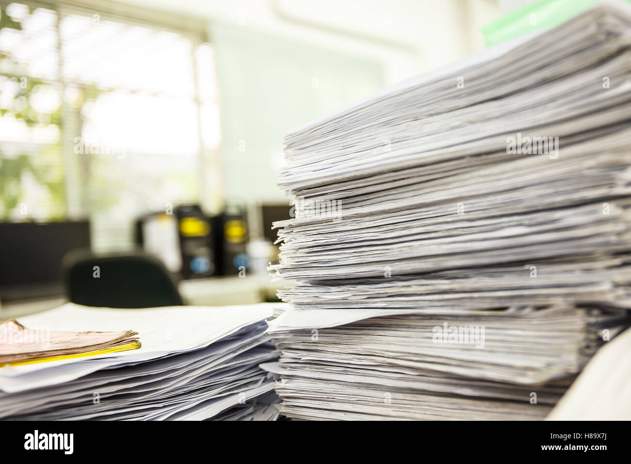 A pile of documents Desk Stock Photo - Alamy