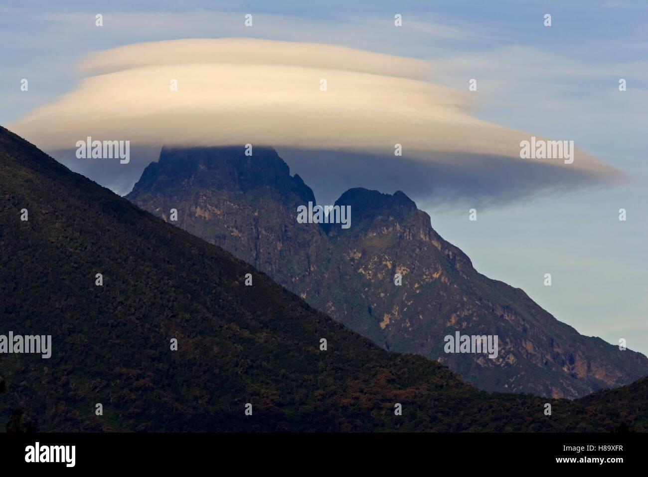 Mikeno Volcano (3634 meters) with lenticular cloud, Republic of the ...