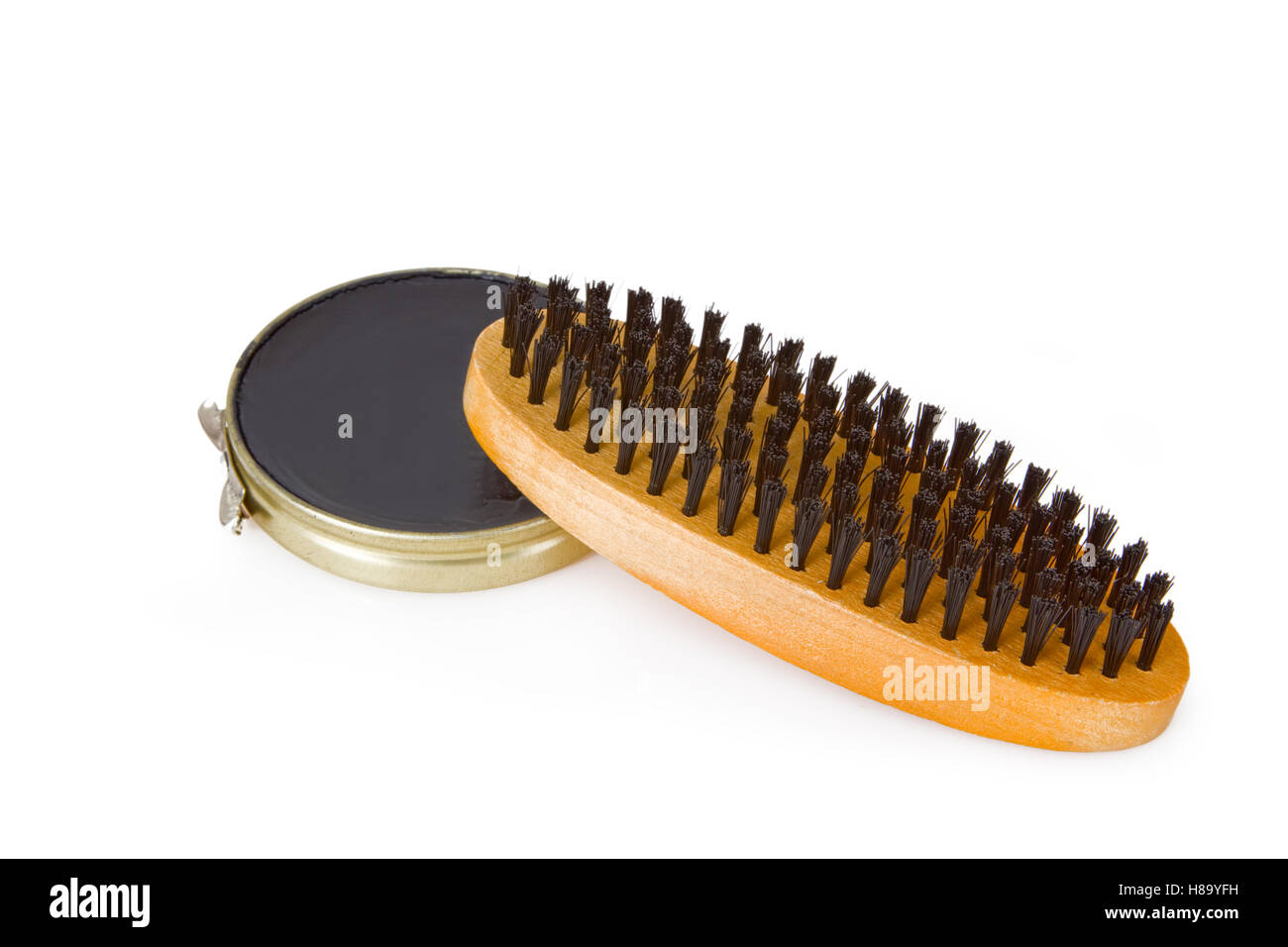 Black shoe polish with shoe brush isolated on white background Stock ...