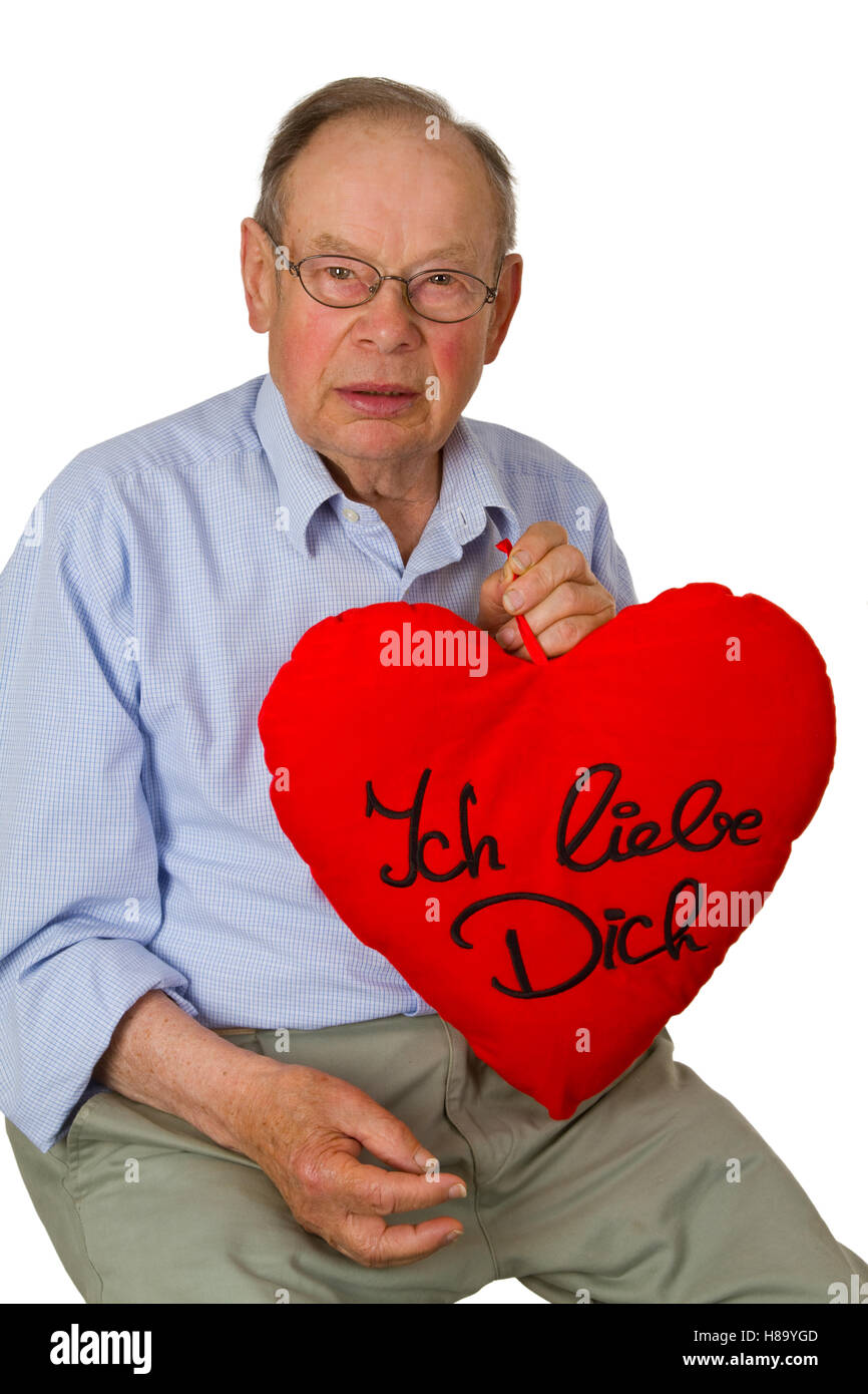 Male senior red heart isolated on white background Stock Photo - Alamy