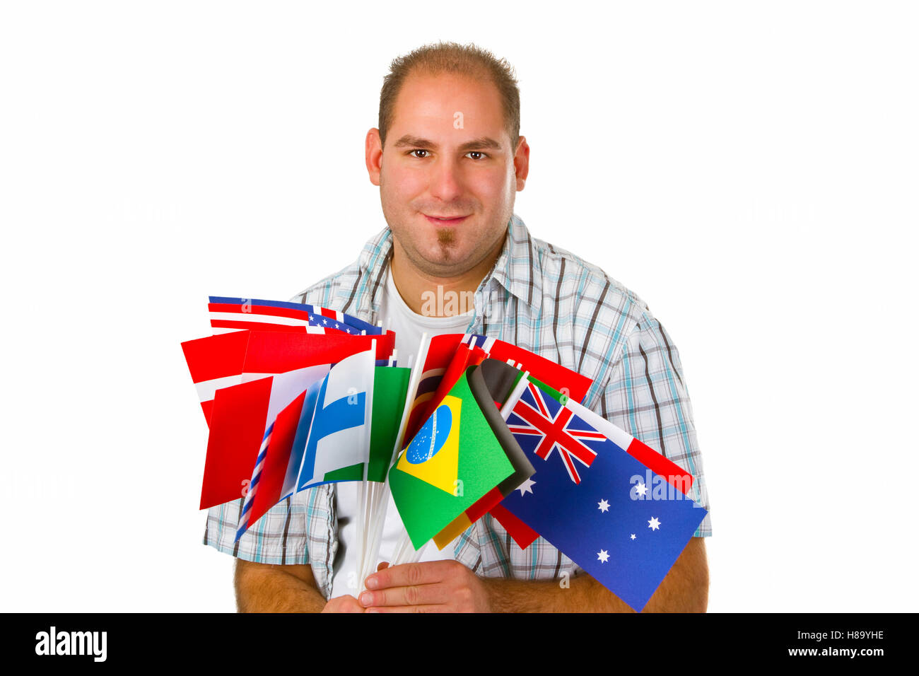Young man with international flags isolated on white background Stock ...