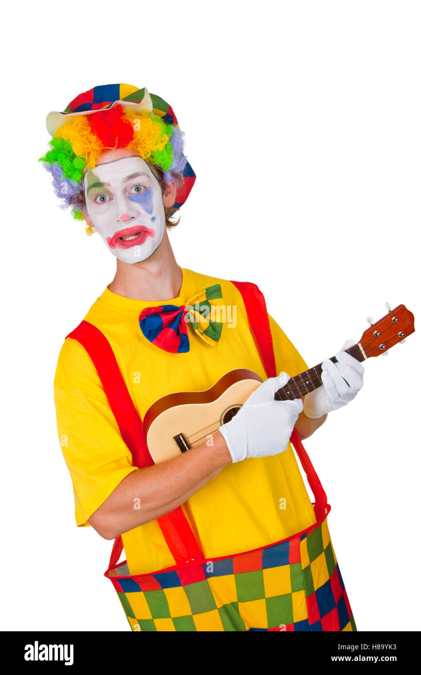 Colorful clown with ukulele isolated on white background Stock Photo ...