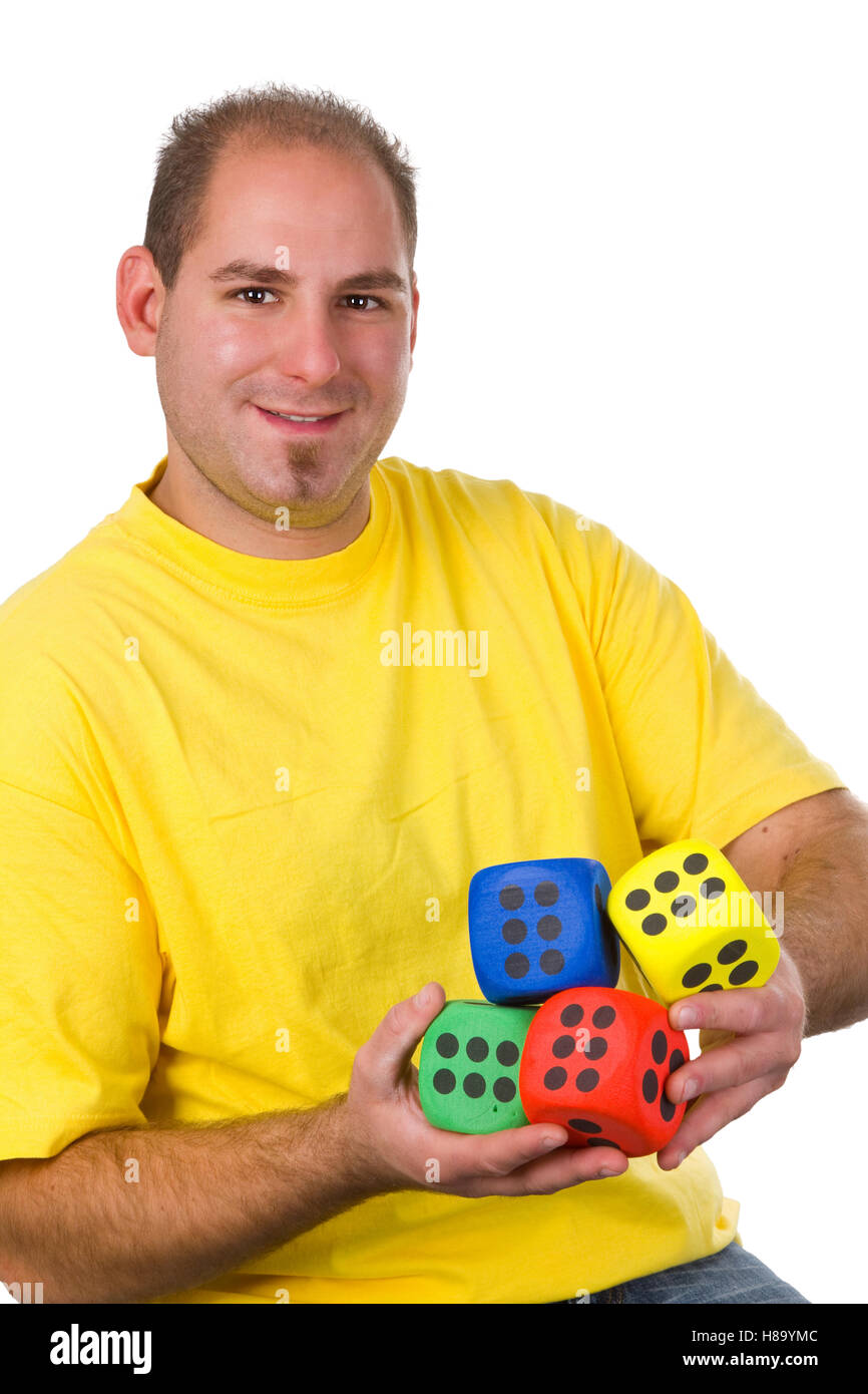 Young man play a dice - isolated on white background Stock Photo - Alamy
