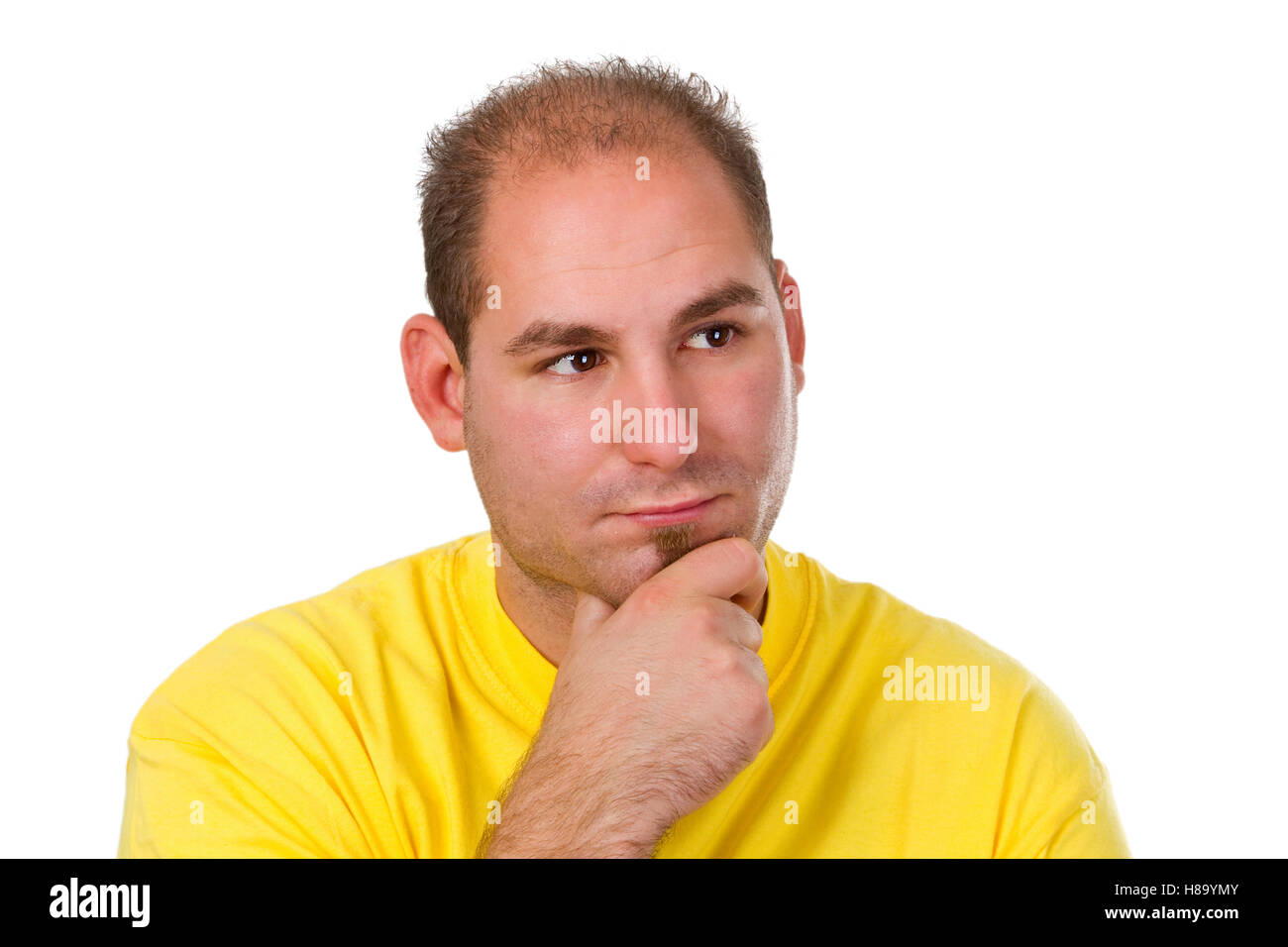 Thoughtful young man - isolated over white background Stock Photo - Alamy