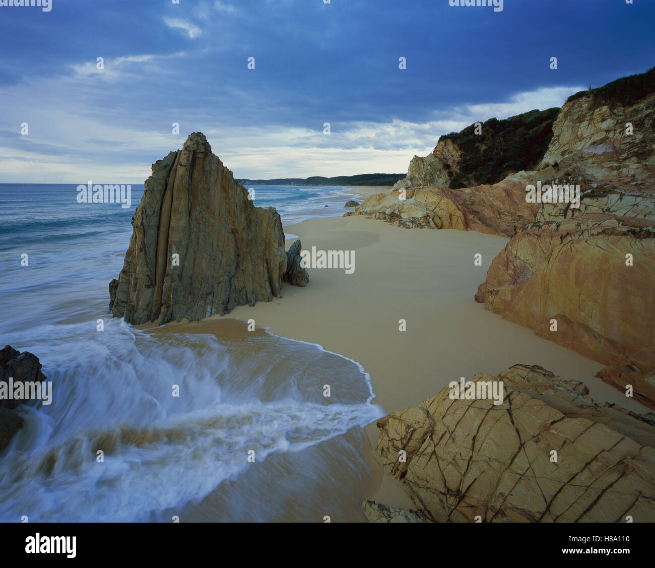 Rocky outcrops on beach, Mimosa National Park, Australia Stock Photo ...