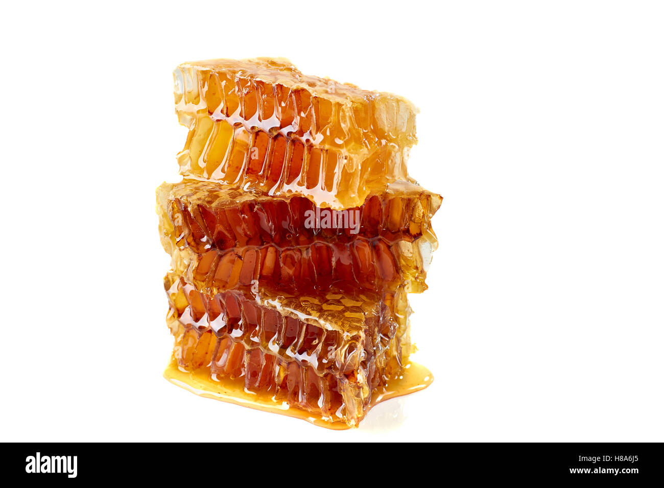 Stack of honeycombs slices on white Stock Photo - Alamy