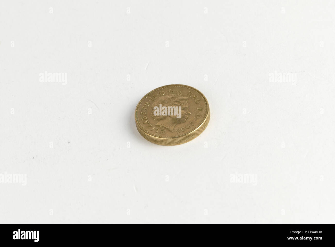 One pound coin isolated on white background Stock Photo - Alamy