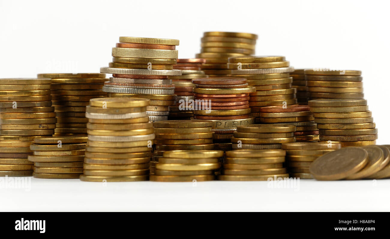 Pile of coins isolated on white background Stock Photo - Alamy