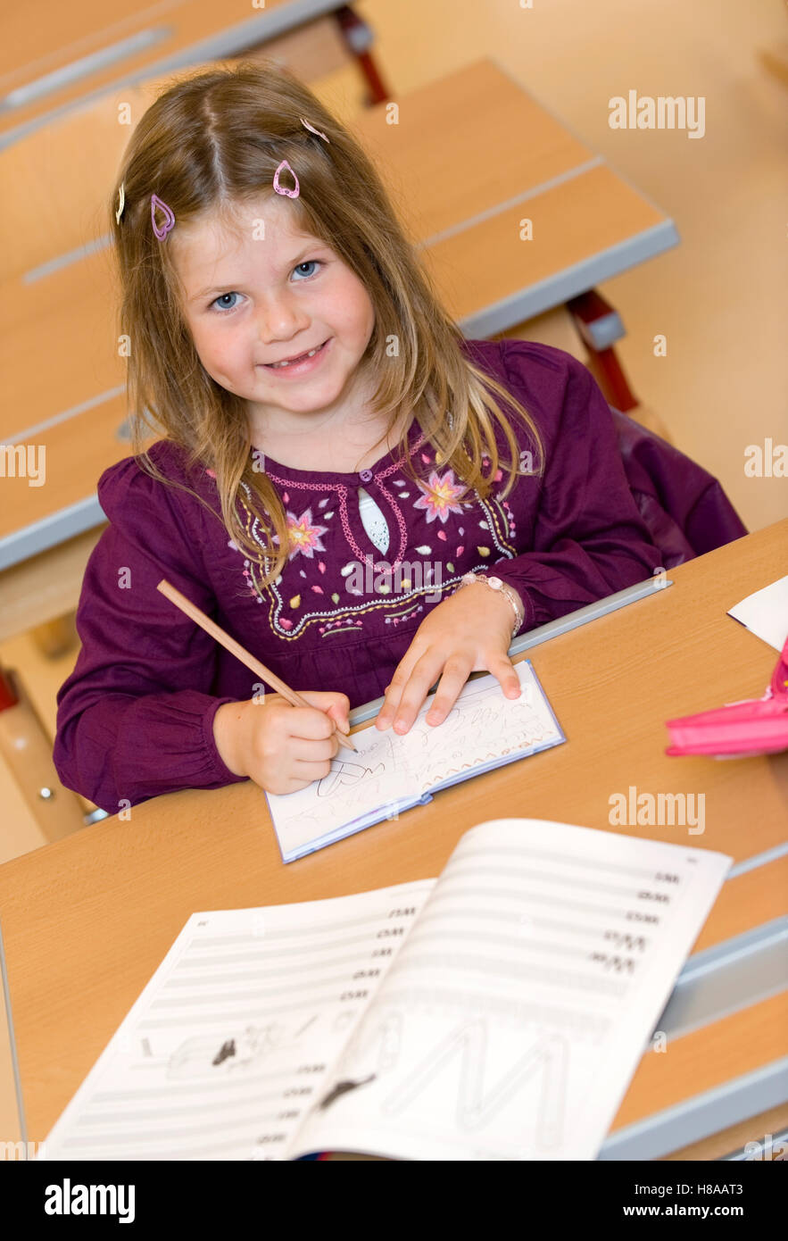 Firstgrader during a lesson Stock Photo - Alamy
