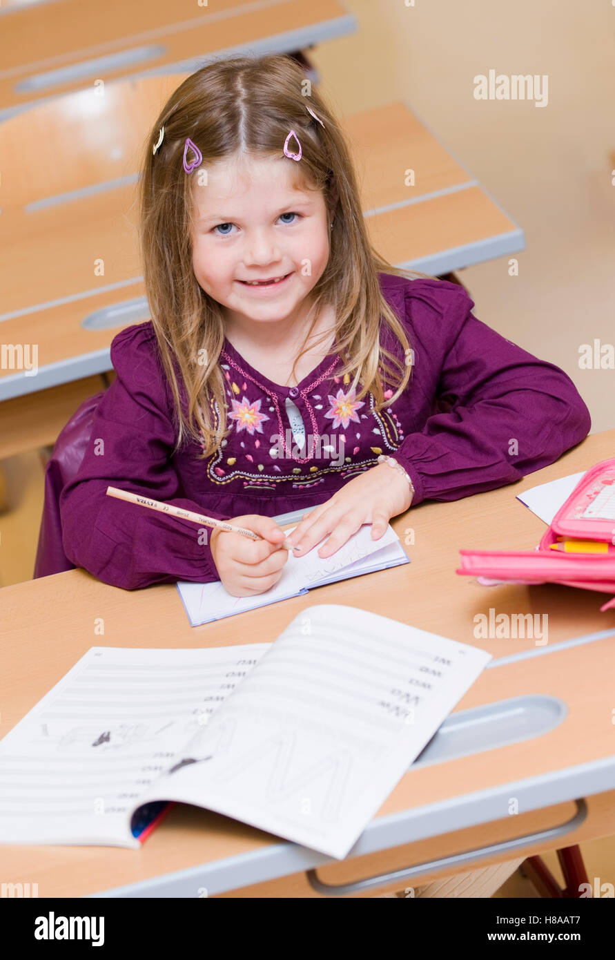 Firstgrader during a lesson Stock Photo - Alamy