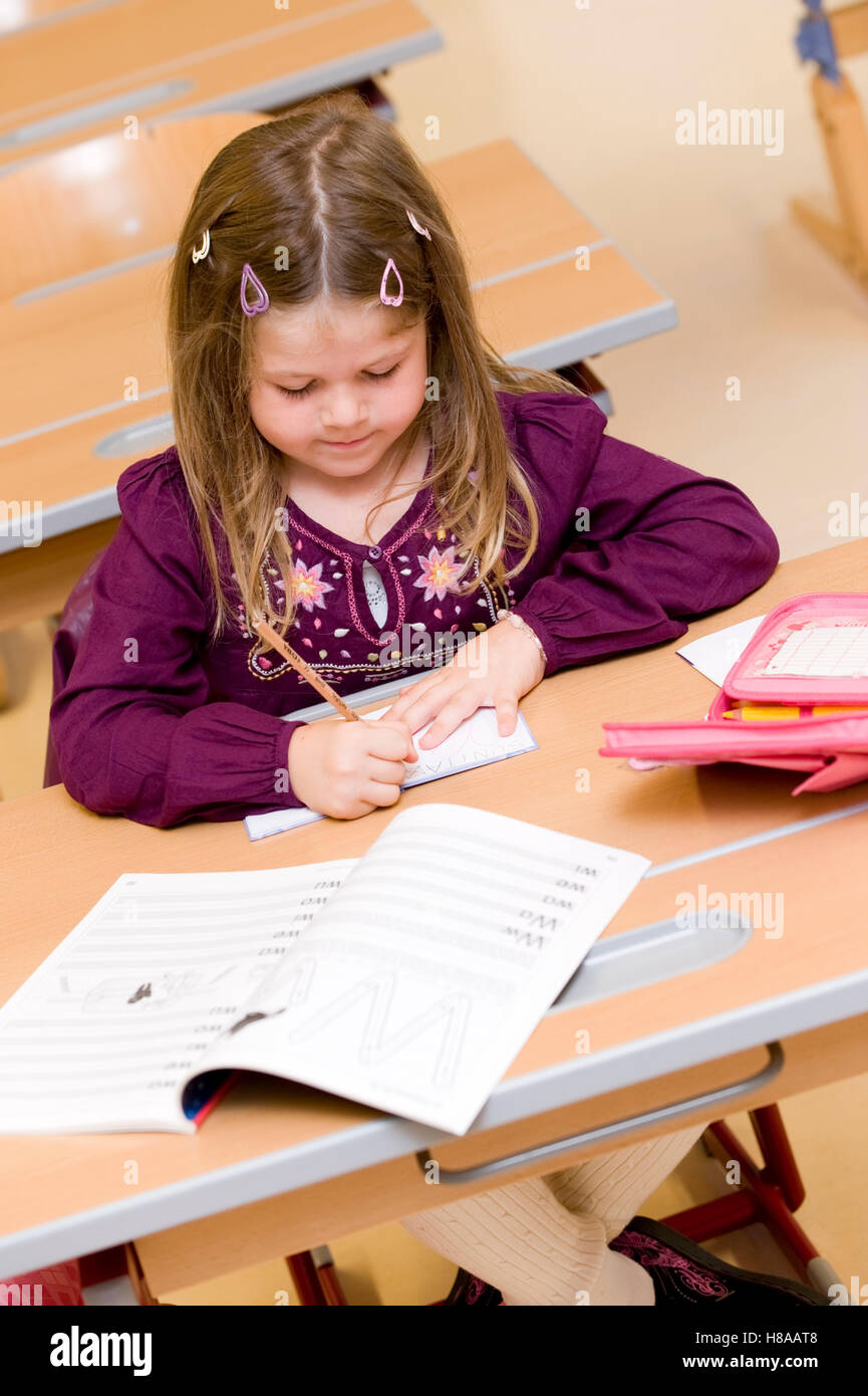 Firstgrader during a lesson Stock Photo - Alamy