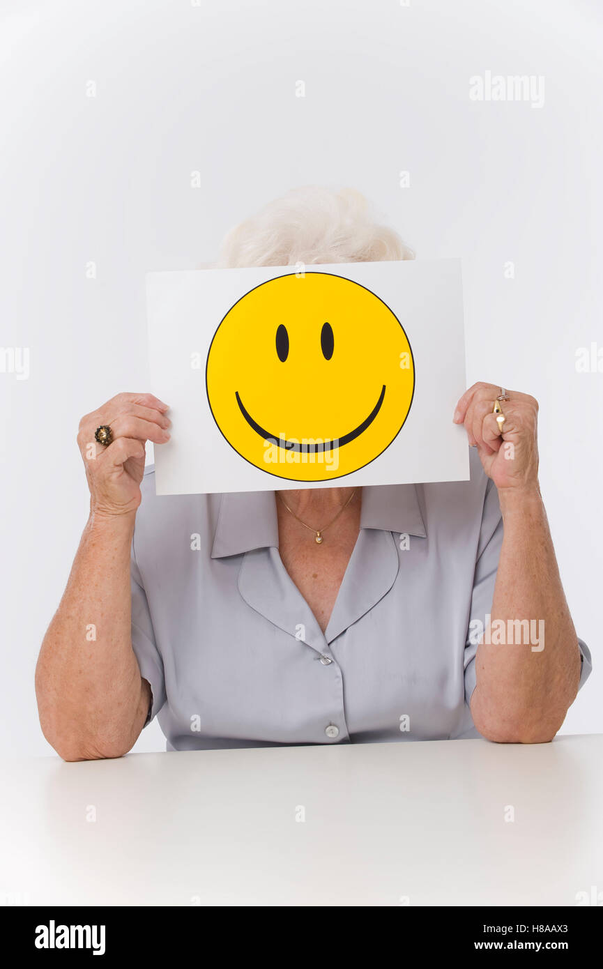 Senior woman with smiley face Stock Photo - Alamy
