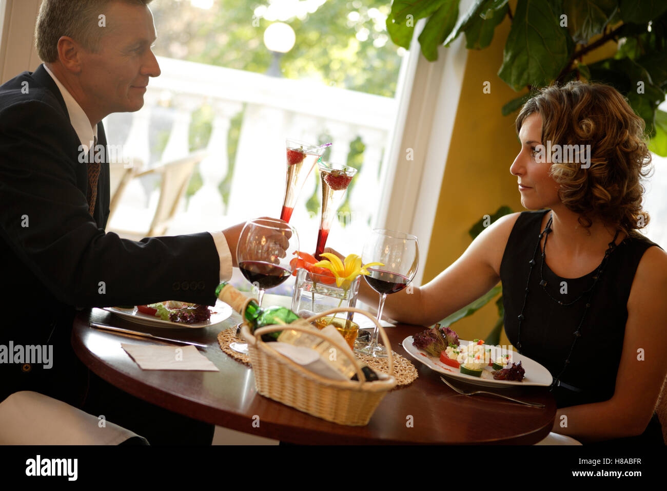 Couple having dinner Stock Photo - Alamy