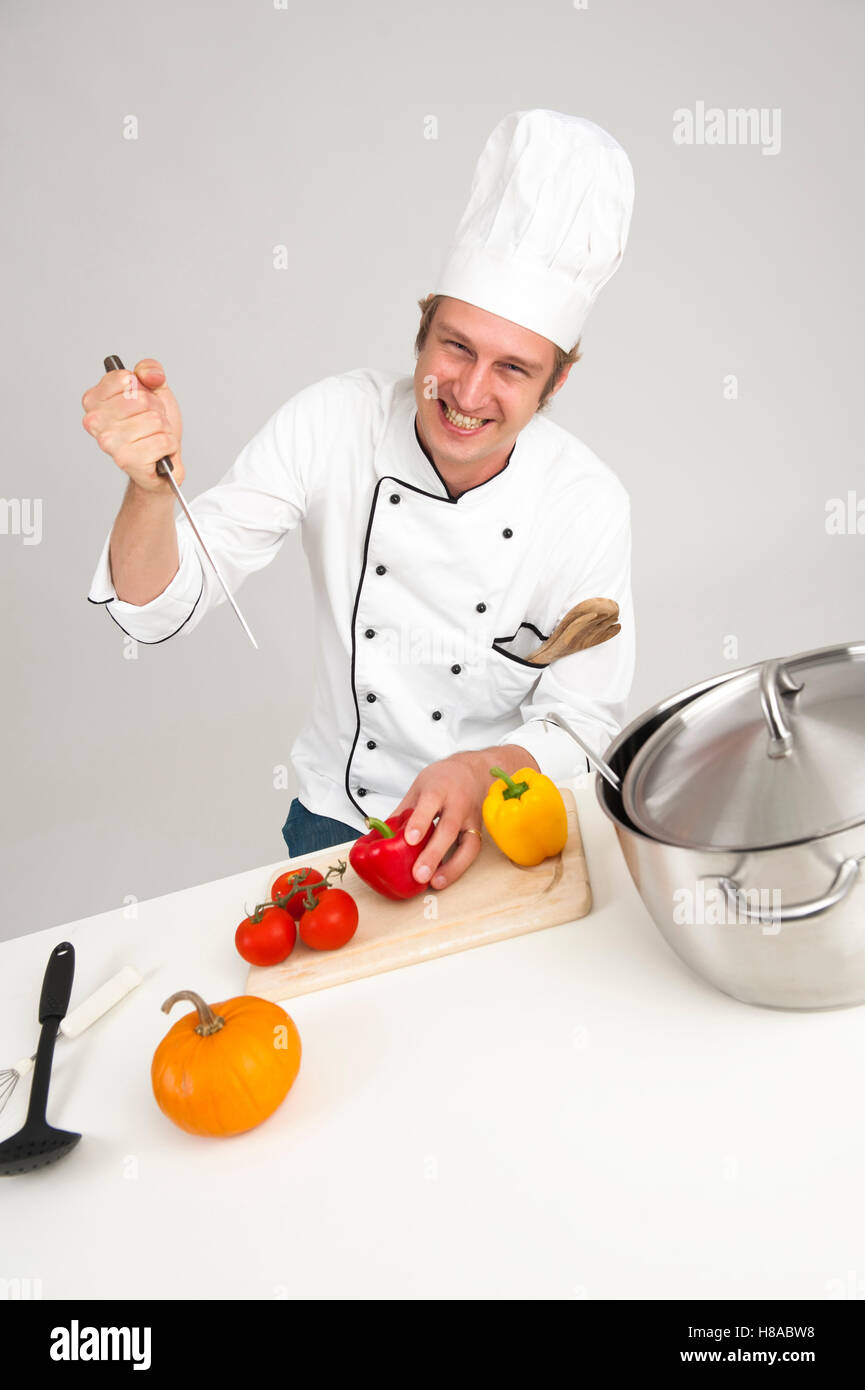 Chef slicing vegetables Stock Photo - Alamy