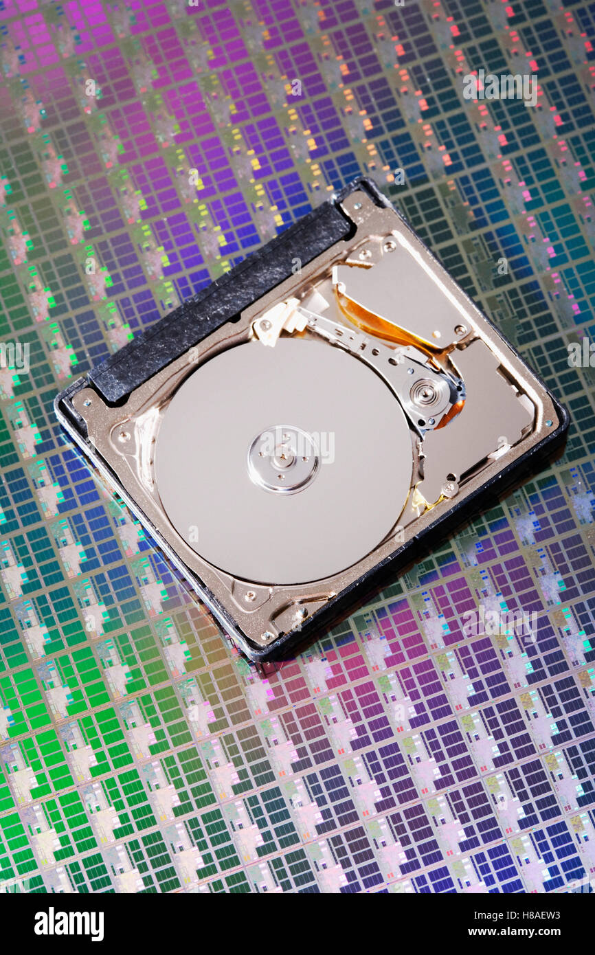 Micro harddrive resting on a silicon wafer Stock Photo - Alamy