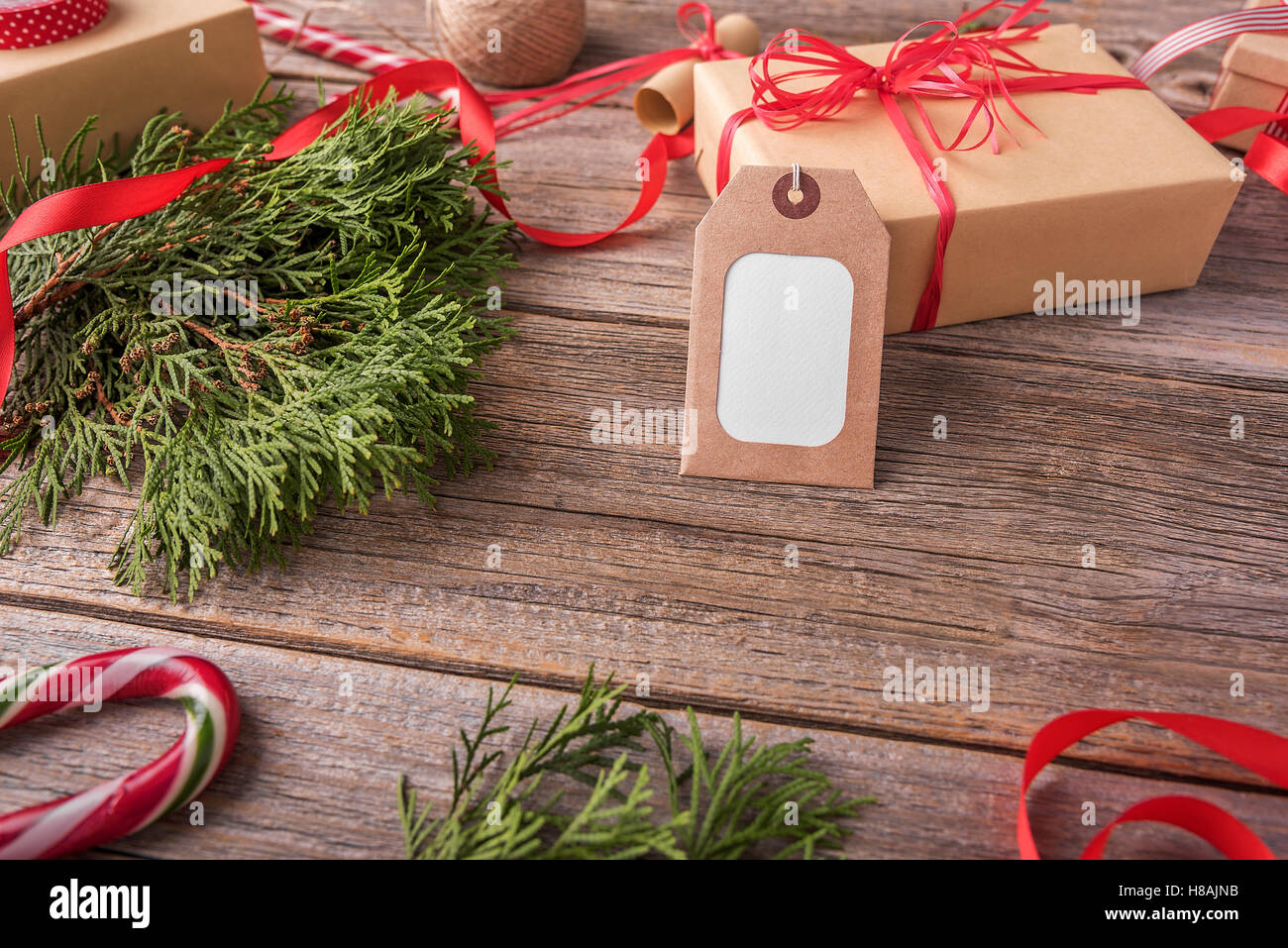 Christmas gift with a greeting card Stock Photo - Alamy