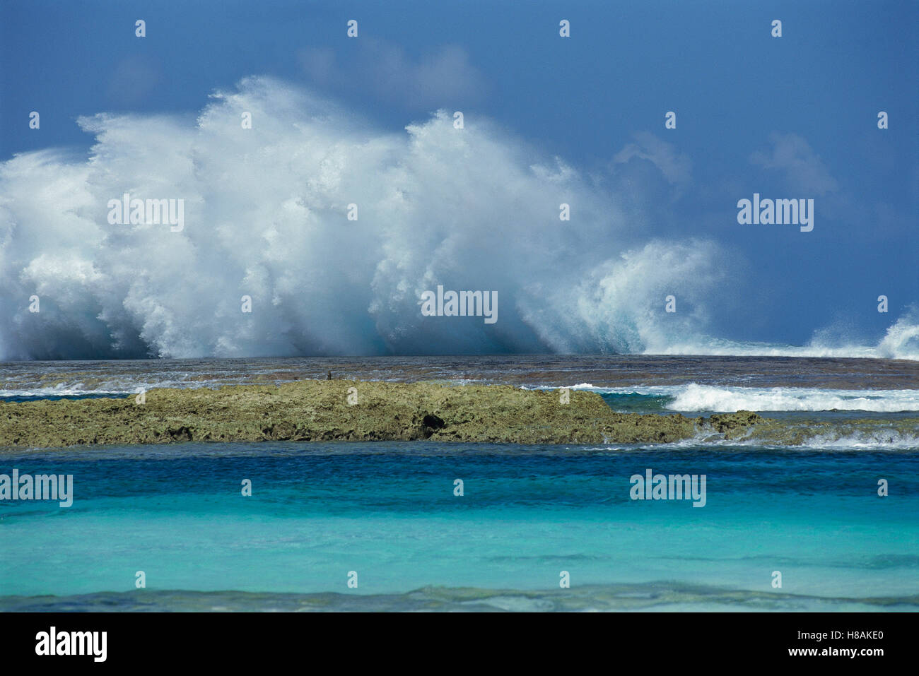 Waves crashing against reef's edges of the only Atoll in all of the ...