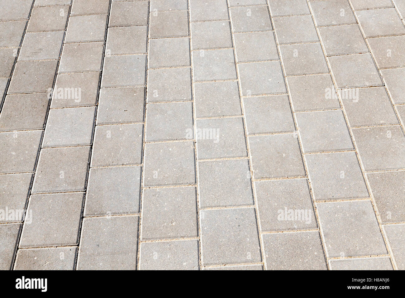 the road from the concrete tiles Stock Photo - Alamy