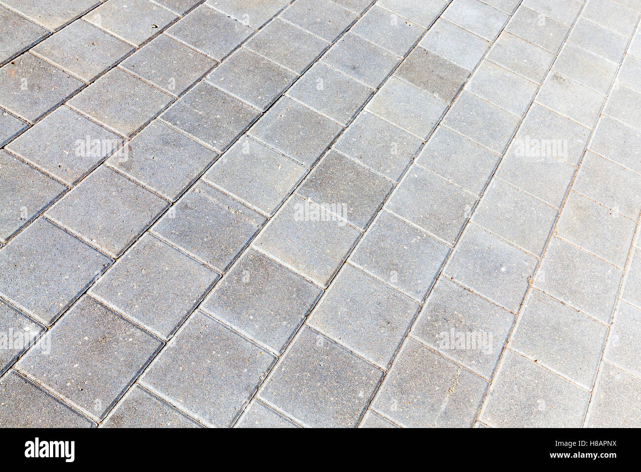 concrete tiles on the road Stock Photo - Alamy