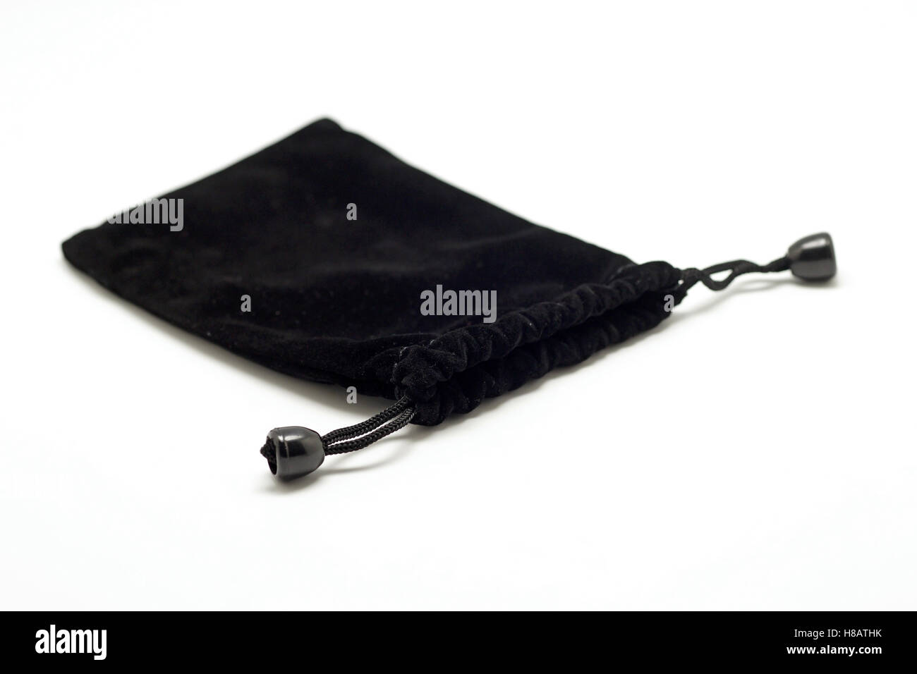 black small fabric pouch isolated on white background Stock Photo - Alamy