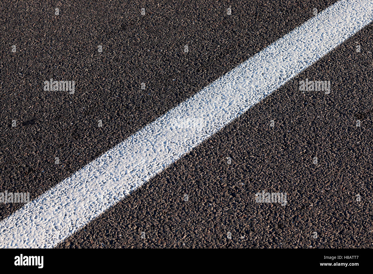 road markings - white stripes Stock Photo - Alamy