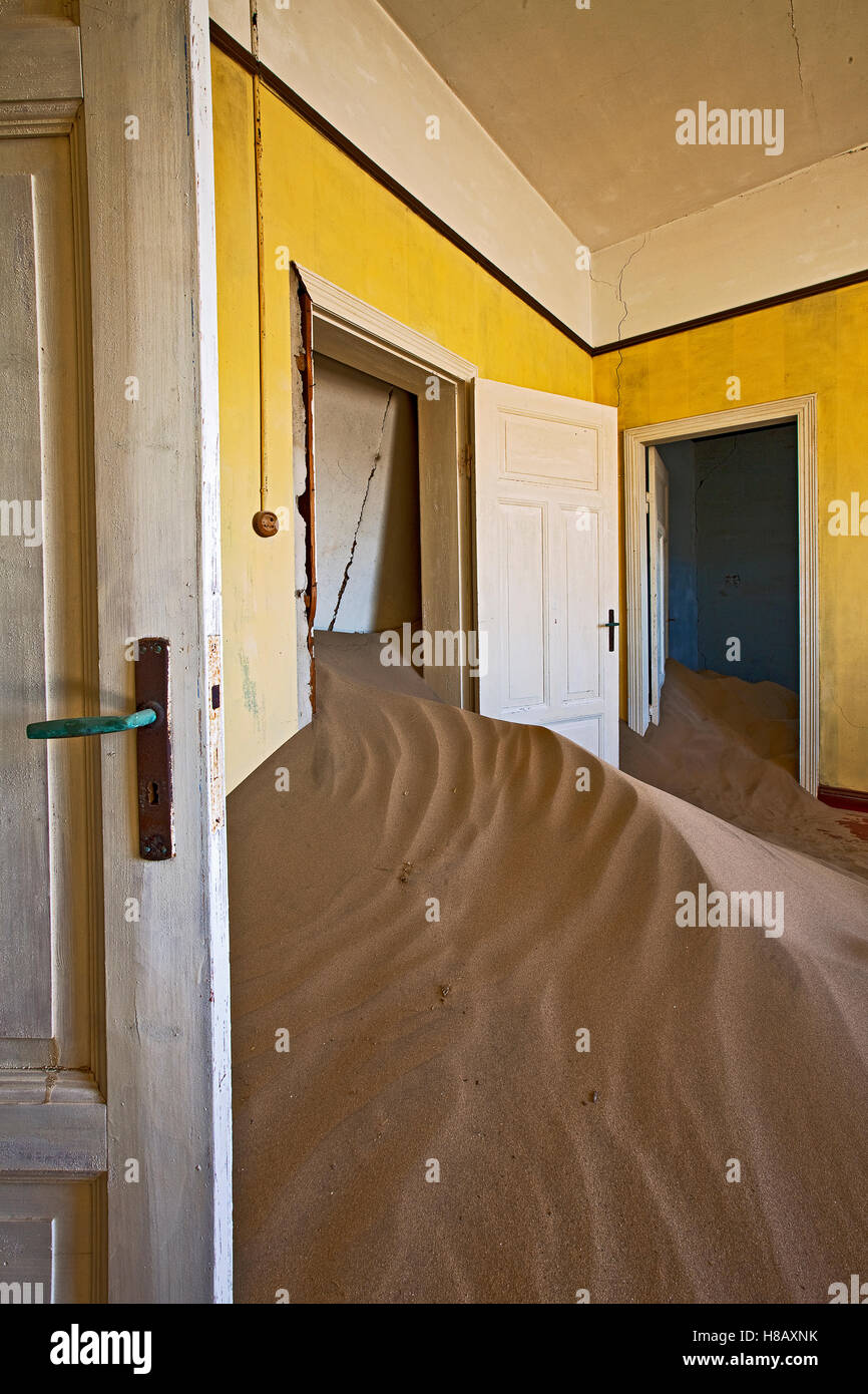 Desert sand inside a deserted house, Kolmanskop, Luderitz, Namibia ...
