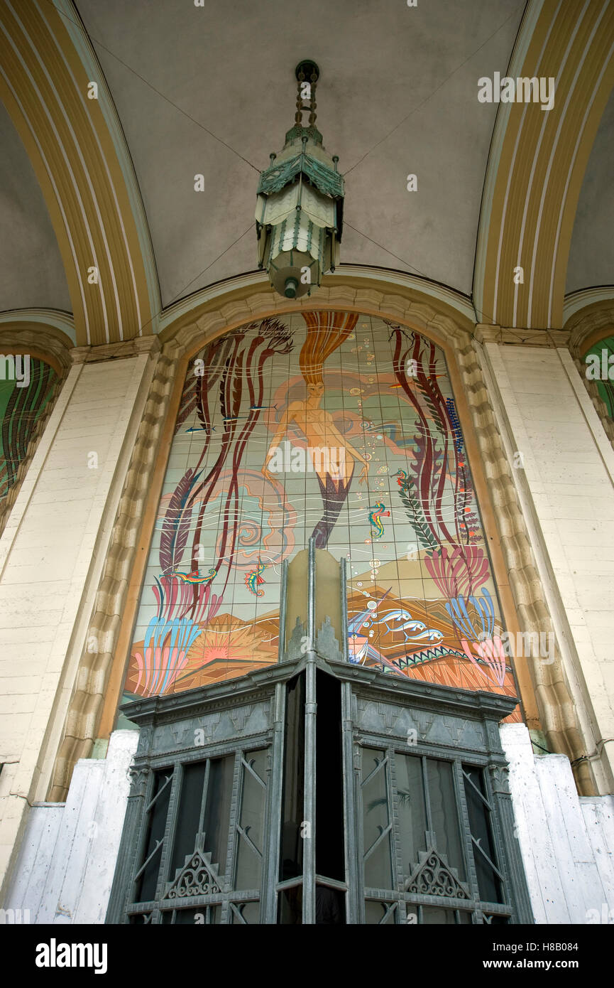 Colorful mosaic tiles depicting a mermaid and underwater scene adorn ...