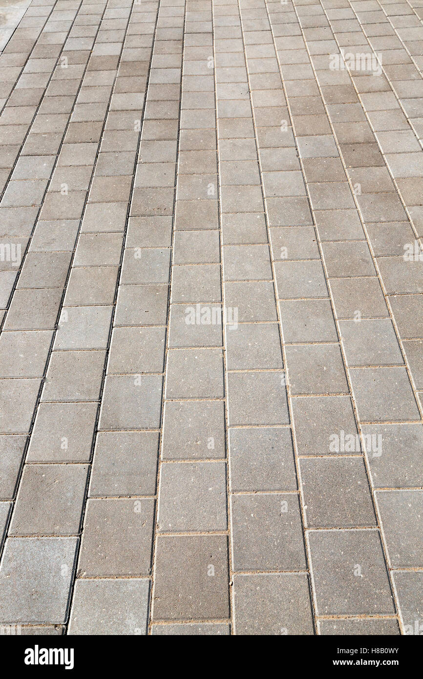 the road from the concrete tiles Stock Photo - Alamy