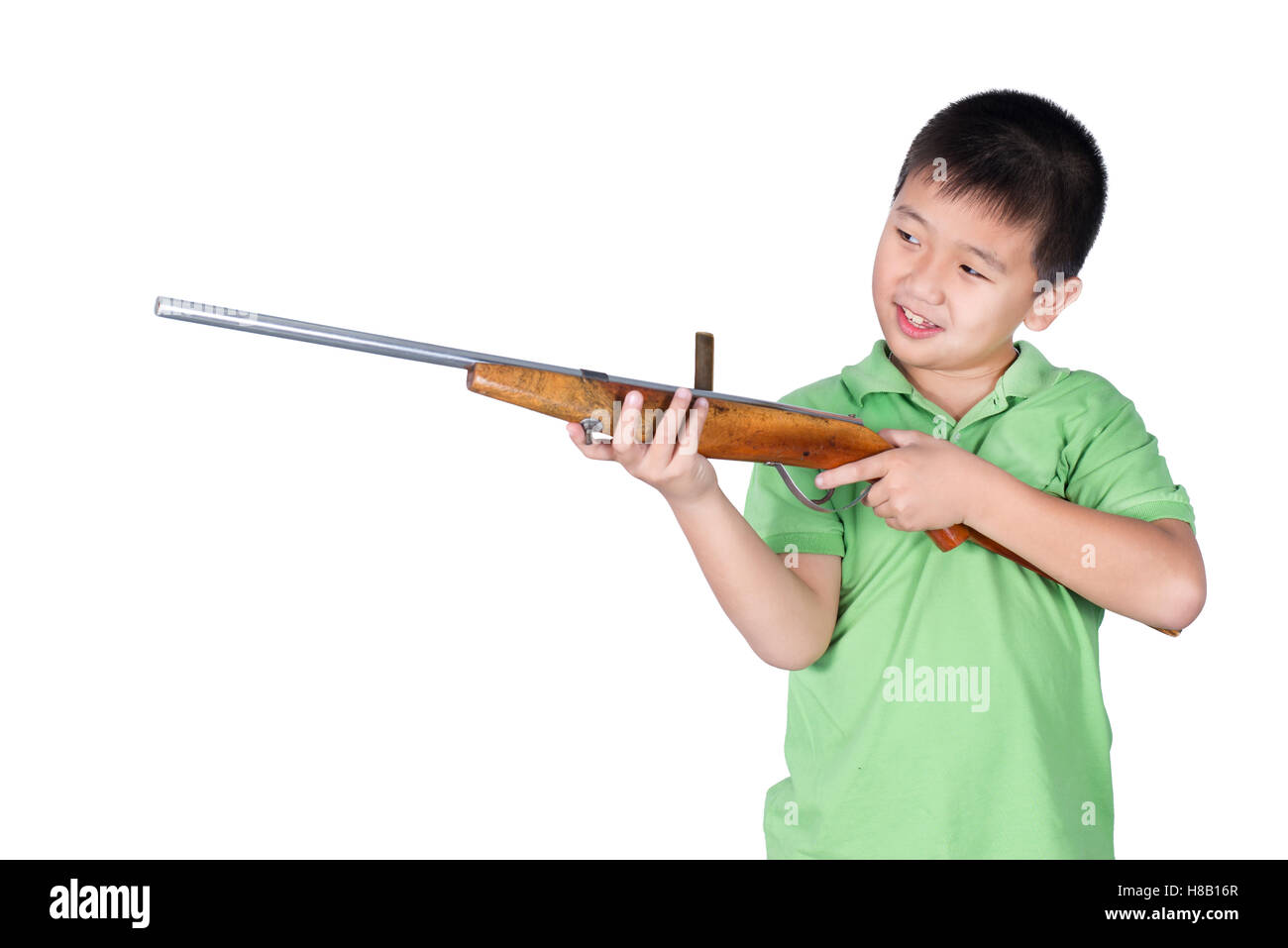 Boy and toy gun rifle isolated on the white background Stock Photo - Alamy