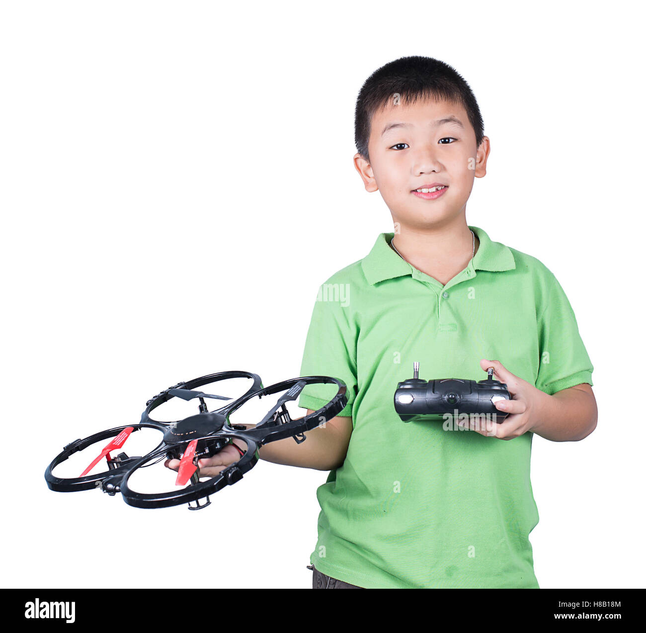 Little boy holding a radio remote control (controlling handset) for ...